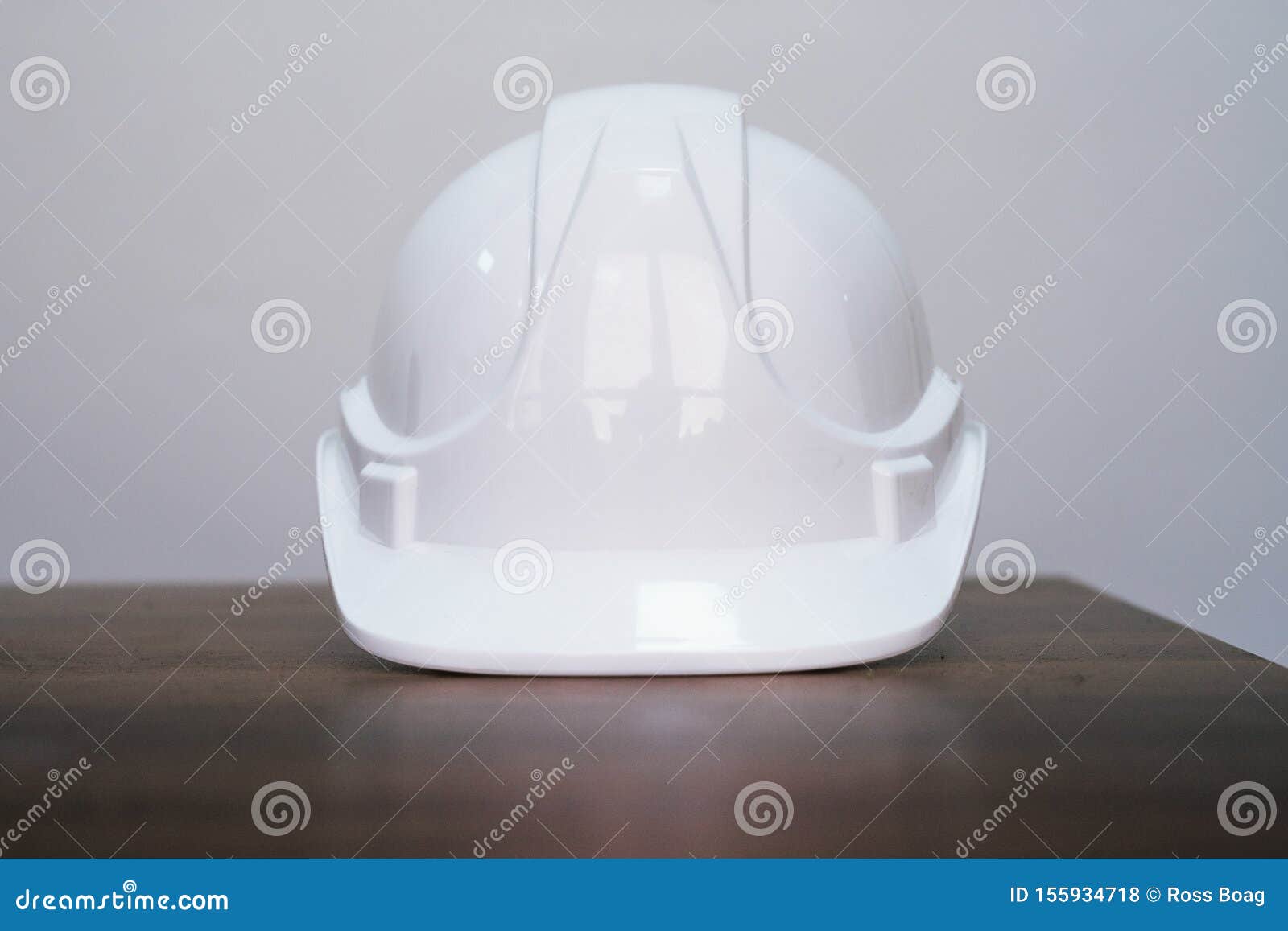 White Hard Hat on Table with White Background Stock Photo - Image of ...