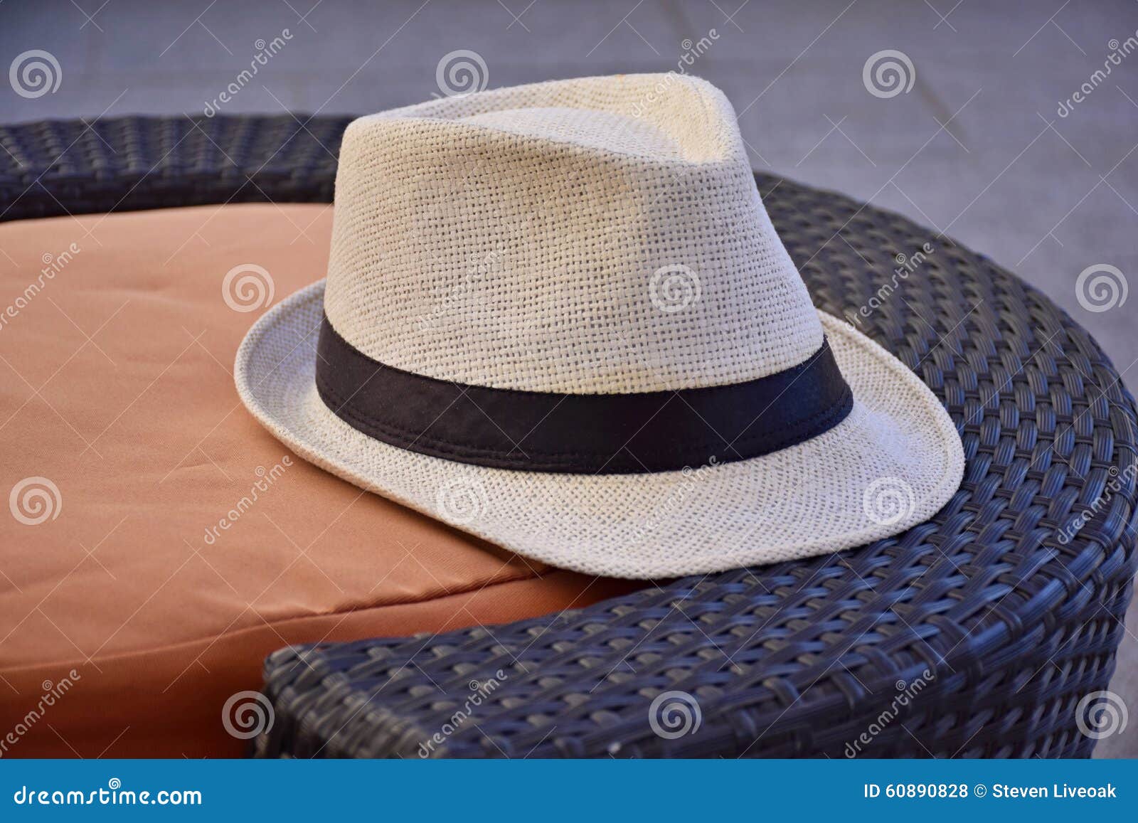 White Hat on a Table stock photo. Image of brimmed, wicker - 60890828