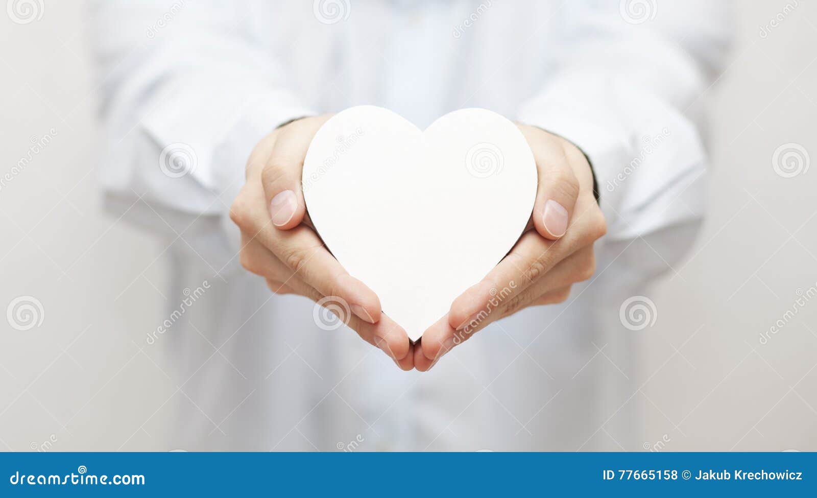 White heart in hands stock photo. Image of health, finger - 77665158