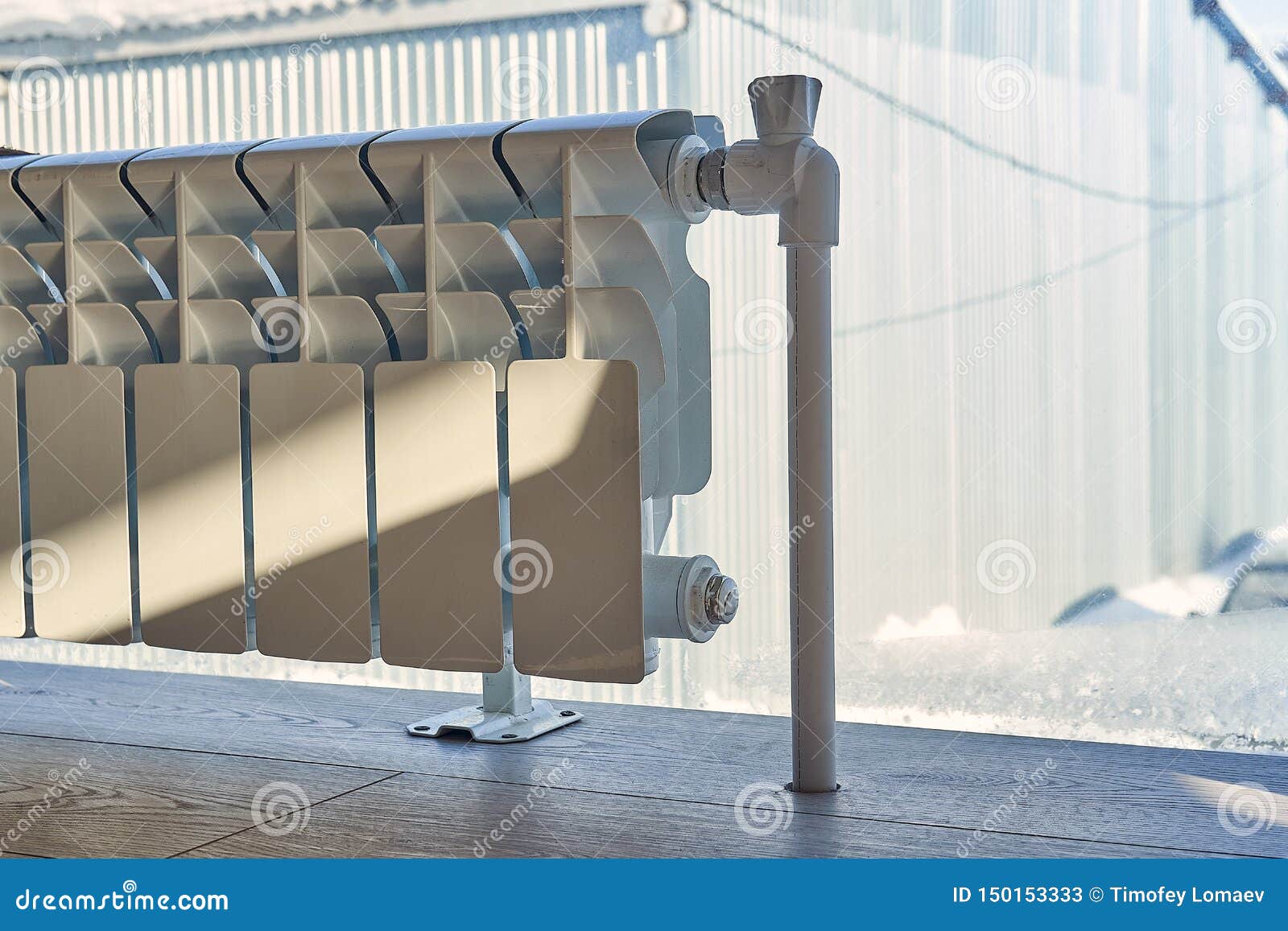 White Heating Radiator in Front of a Large Window Stock Image - Image ...