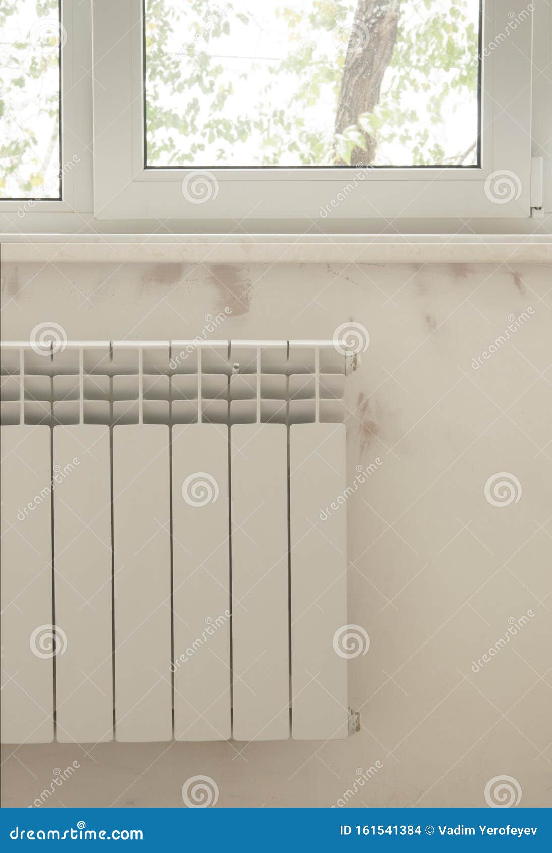 A White Heating Radiator on the Wall Stock Photo - Image of temperature ...