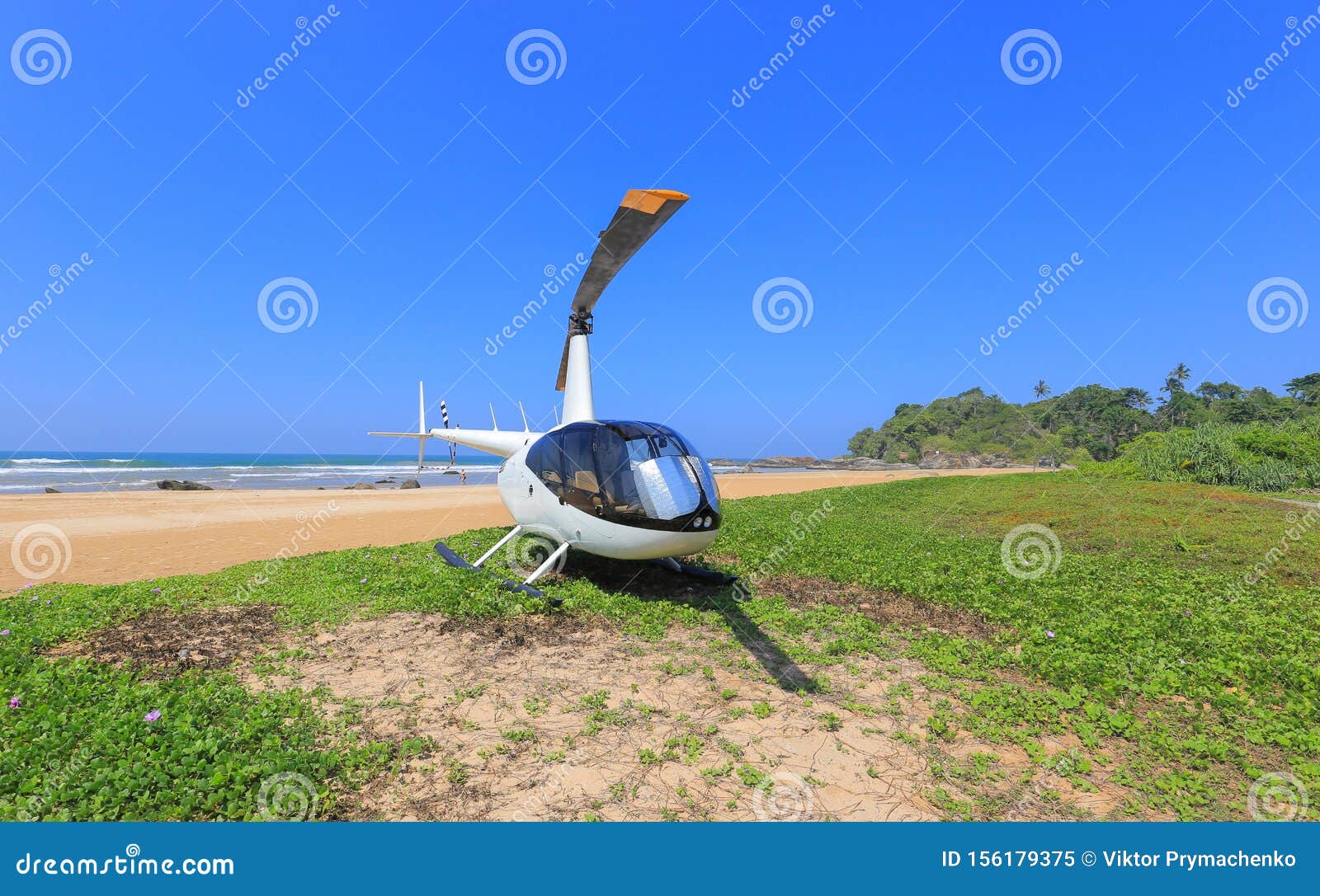 Helicopter on the beach stock image. Image of robinson - 156179375