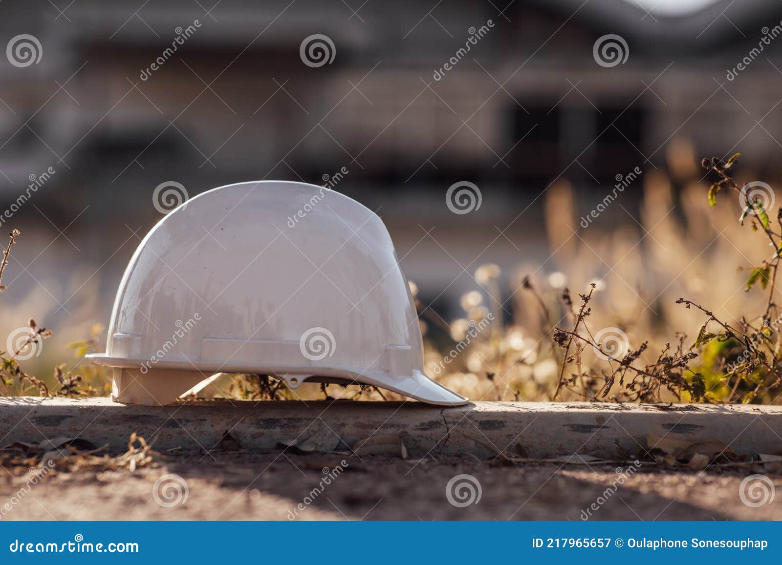 White Helmet on Construction Building Site. Stock Image - Image of ...