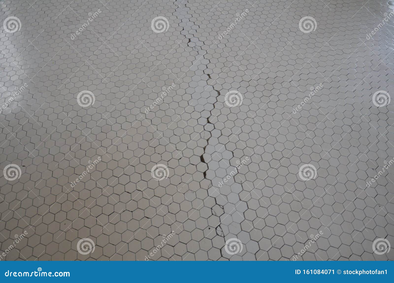 White Hexagon Floor Tile with Cracks or Damage Stock Image - Image of ...