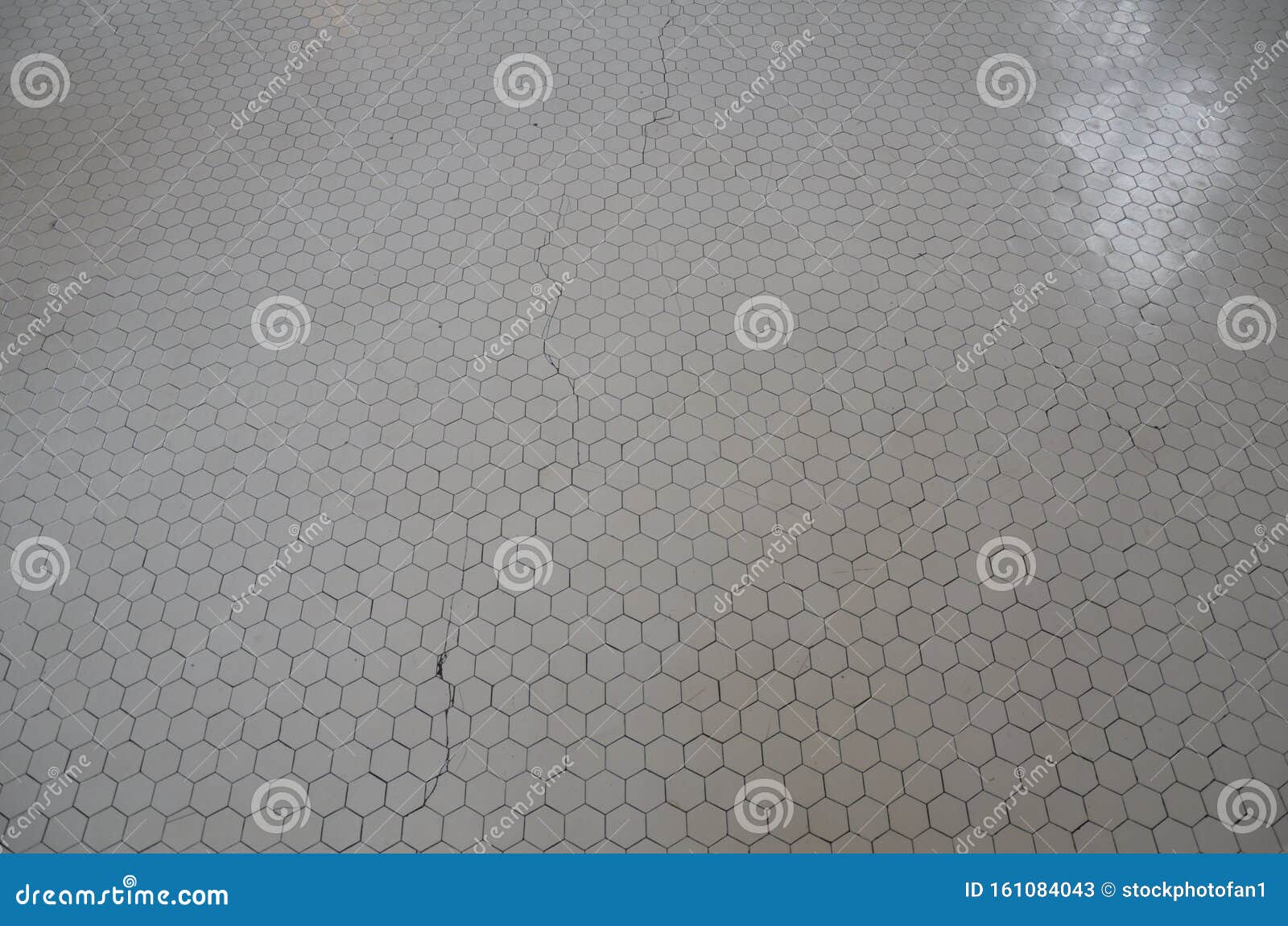 White Hexagon Floor Tile with Cracks or Damage Stock Image - Image of ...