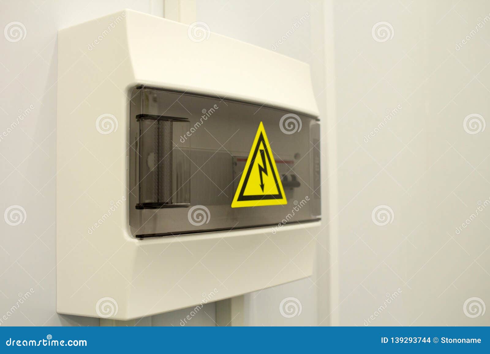 White Hinged Power Supply Box on the Wall Stock Photo - Image of ...