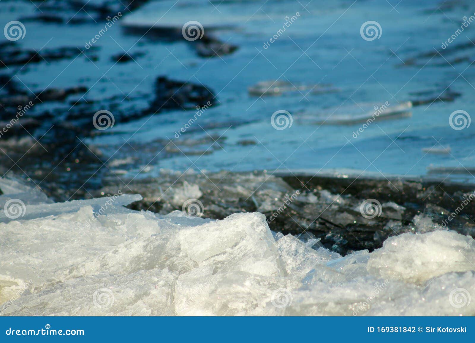 White Ice Floating on Background of Blue Water Stock Photo - Image of ...