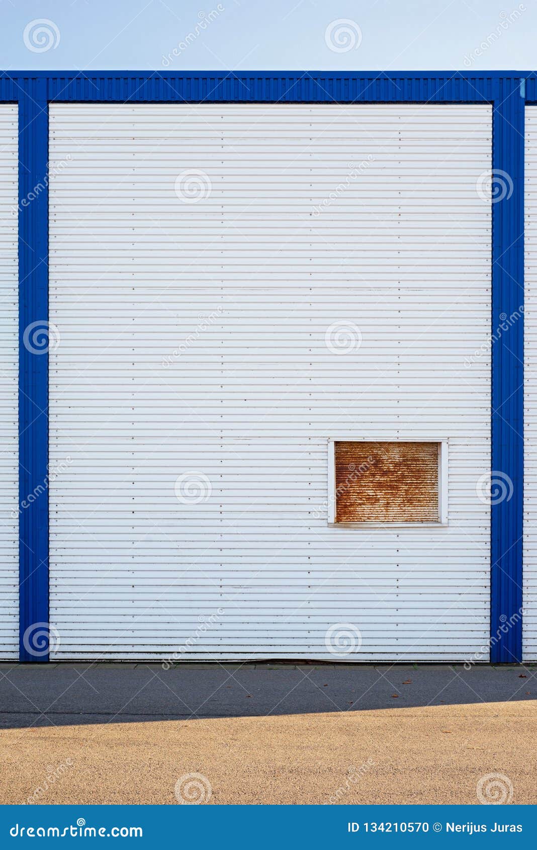 White Industrial Warehouse Wall in Blue Frame. Stock Photo - Image of ...
