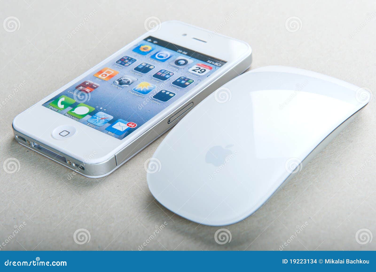 White IPhone 4(S) and Magic Mouse Editorial Stock Image - Image of ...