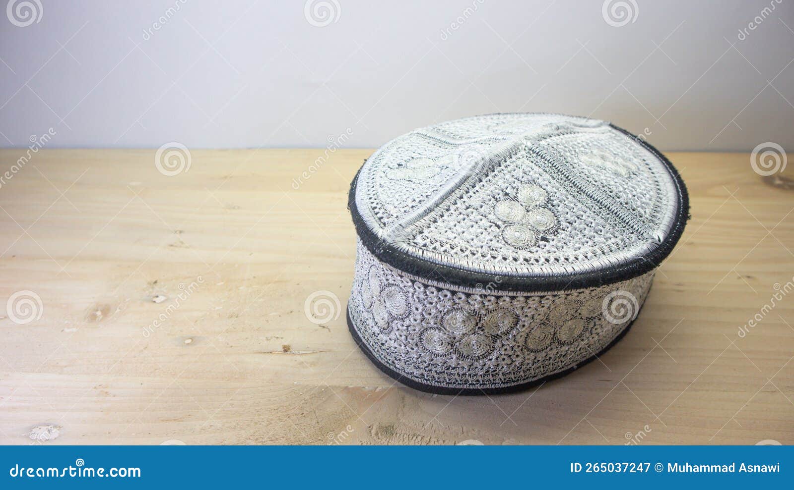 White Islamic Caps with Black Patterns are Usually Worn by Muslim Men ...