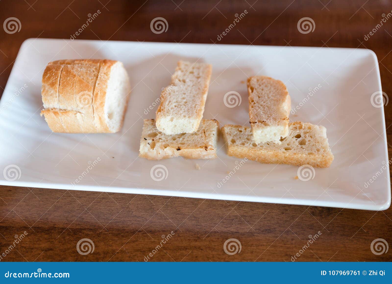 White Italian Delicious Artisan Bread with on a White Plate Stock Image ...