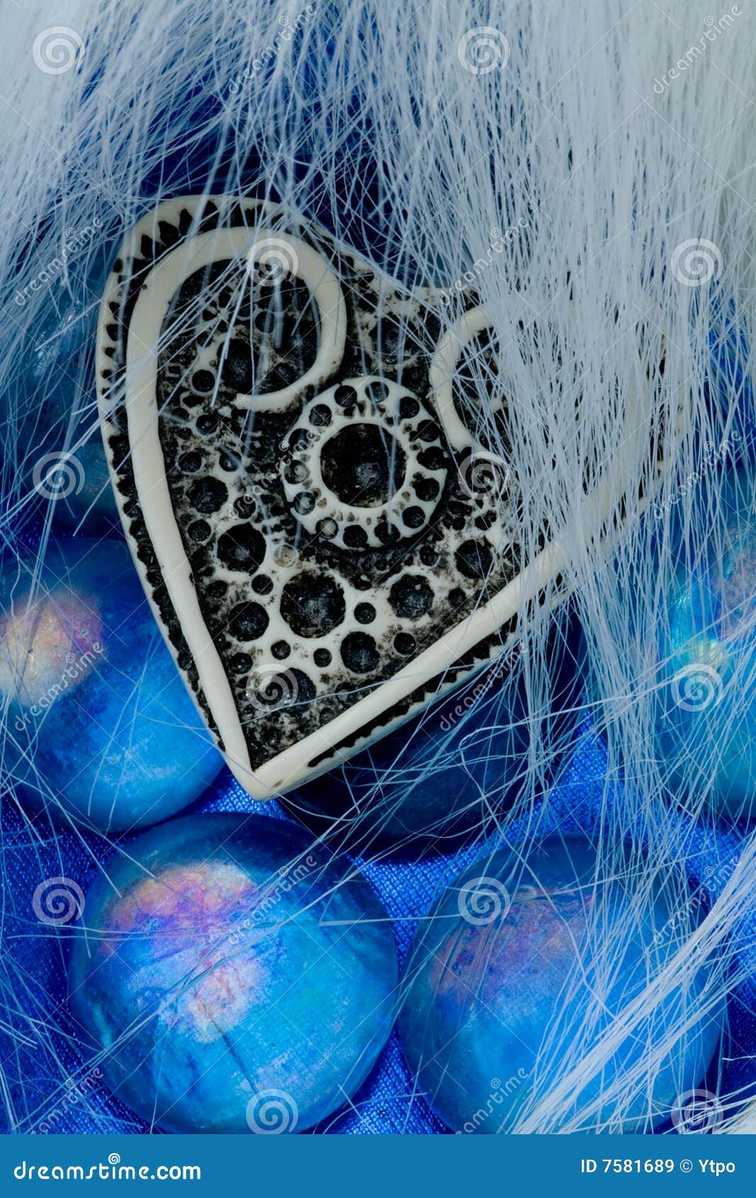 White Ivory Heart Shape on Blue Glasses Stock Image - Image of heart ...