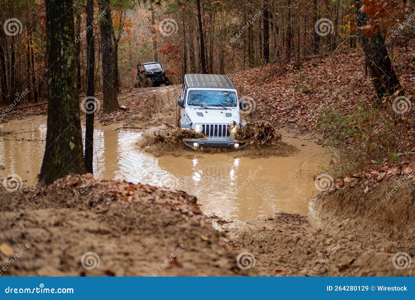 White Jeep Rubicon JK Driving through Mud. Editorial Stock Image ...