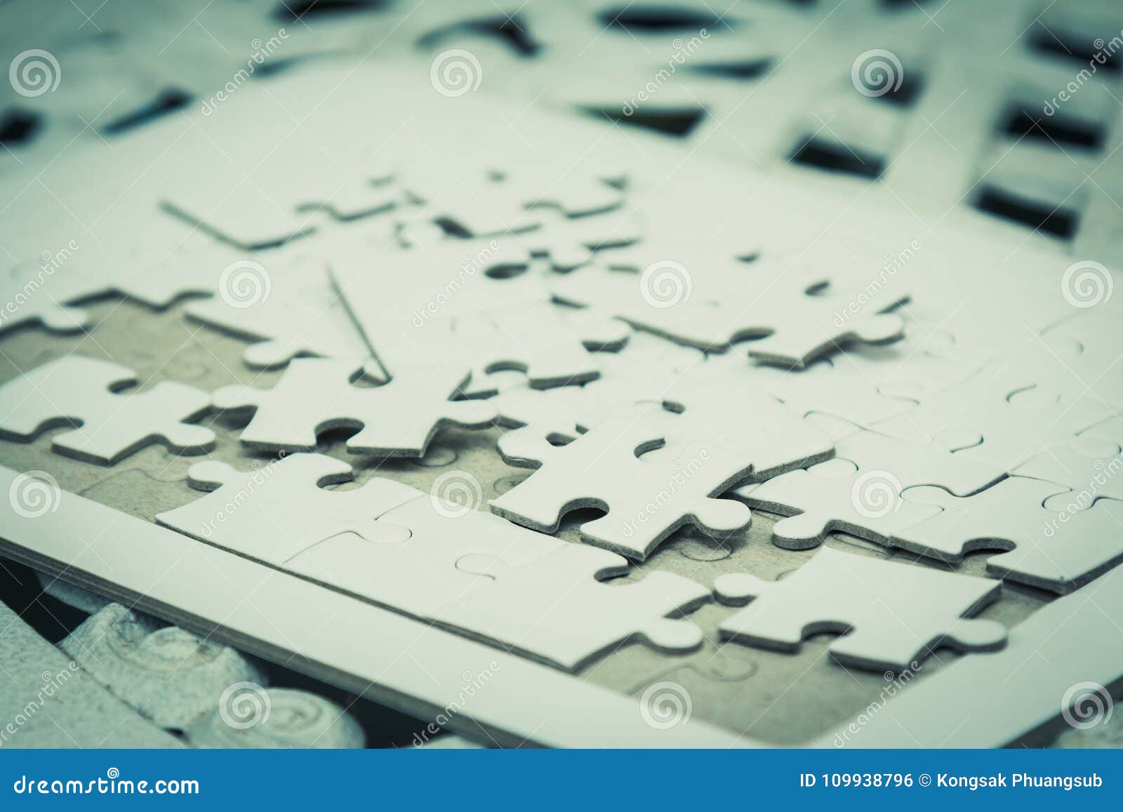 White Jig Saw Puzzle Spilled Out on the Table Stock Photo - Image of ...