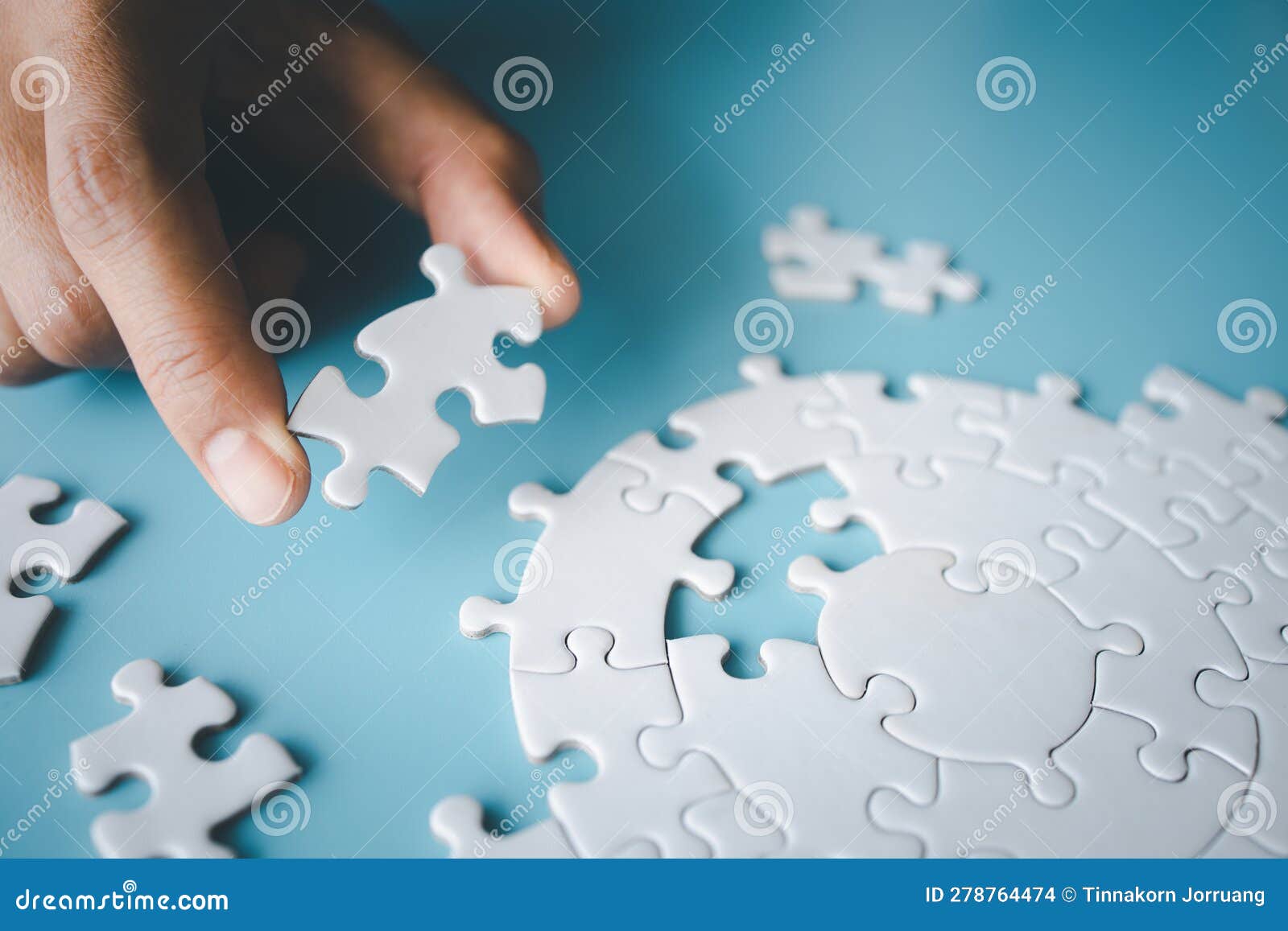 White Jigsaw in the Hands of Humans, the Correct Solution. Teamwork ...