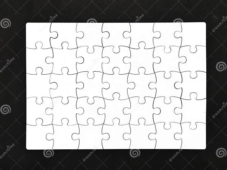 White Jigsaw Puzzle on Black Background, Top Angle View Stock Image ...