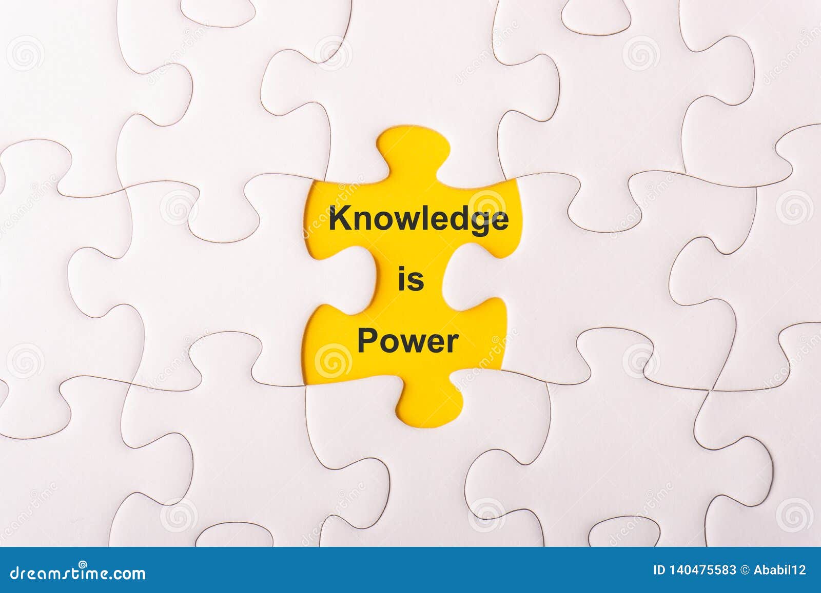 White Jigsaw Puzzle and Missing Pieces with Words KNOWLEDGE is POWER ...