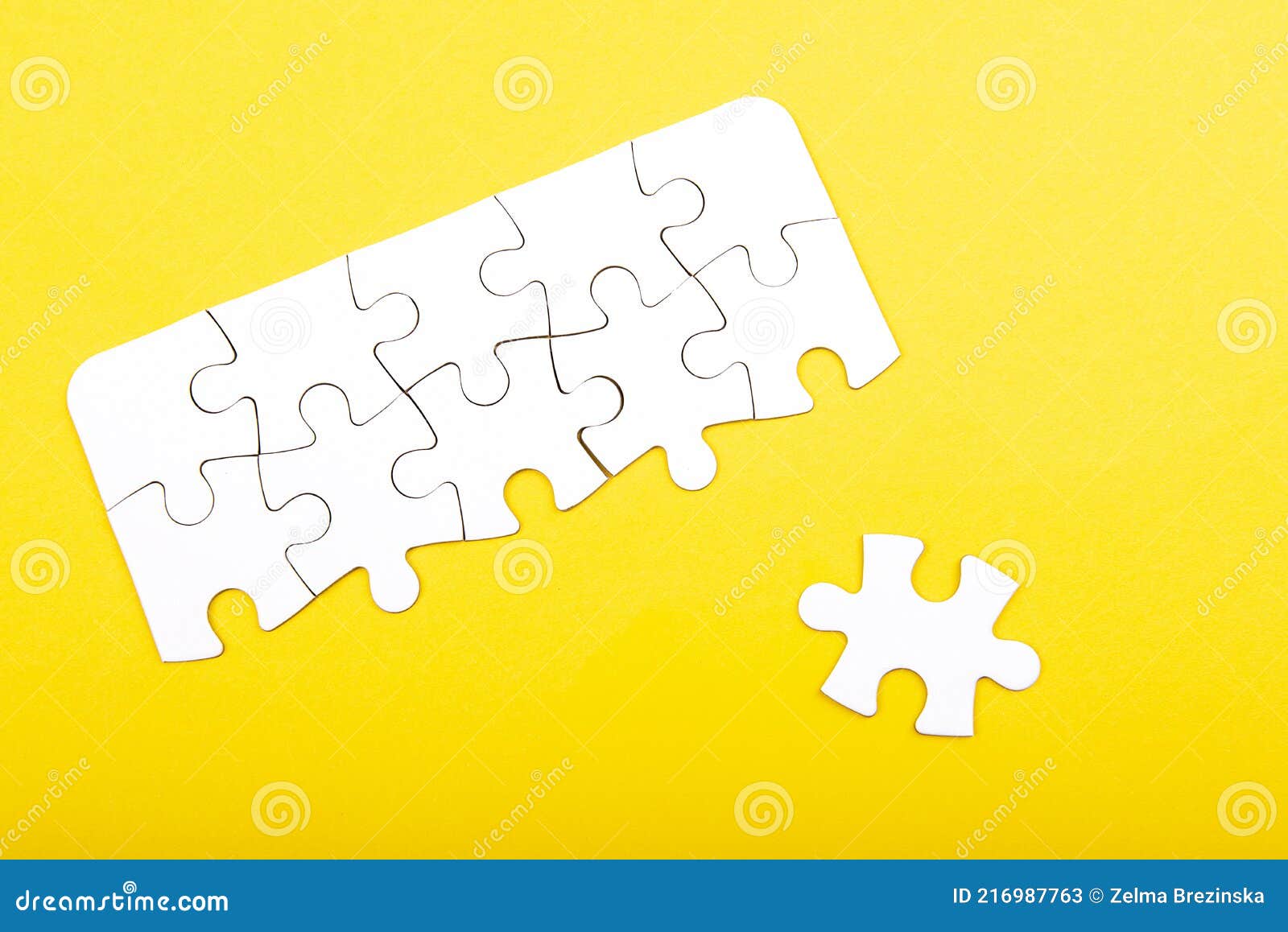 White Jigsaw Puzzle on a Yellow Background Stock Image - Image of game ...