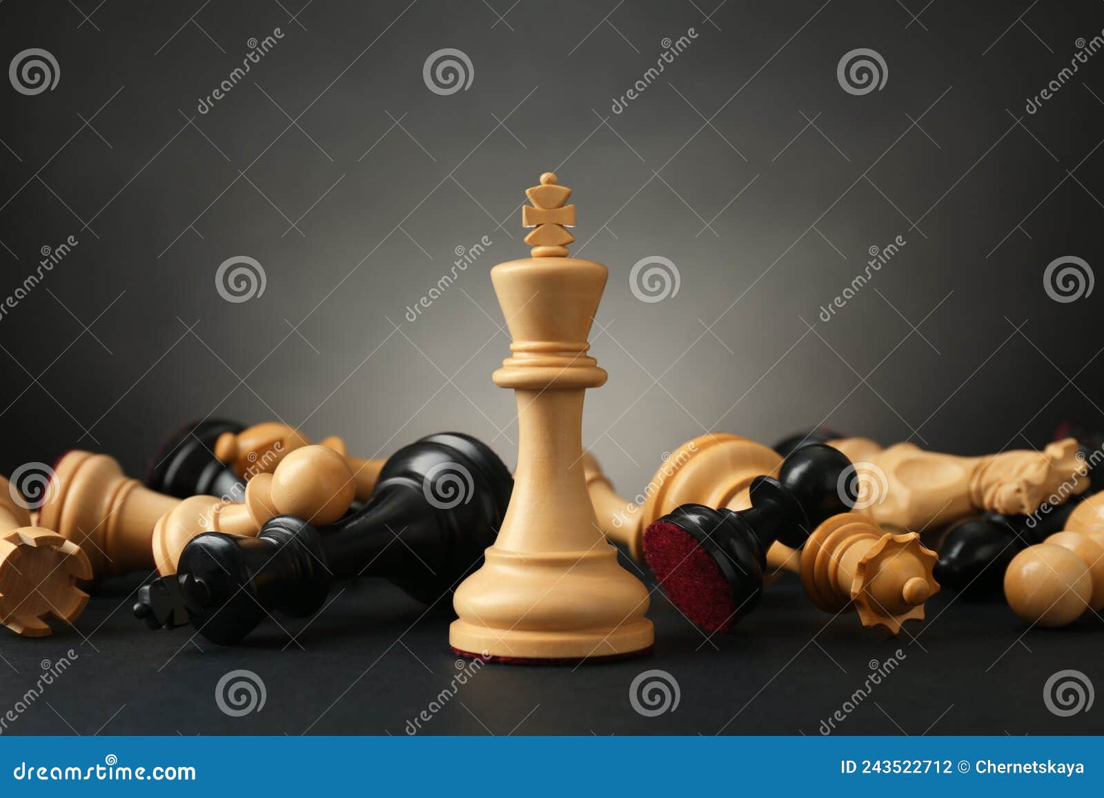White King among Fallen Chess Pieces on Dark Background Stock Photo ...