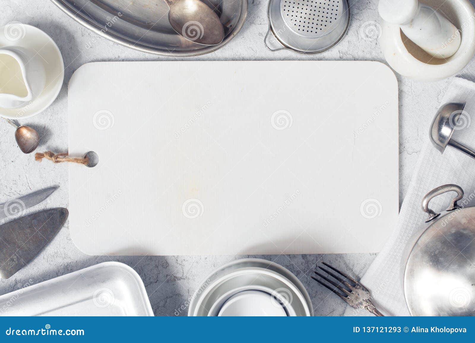 White Kitchen Background - Cutting Board Decorated with Cookware Stock ...
