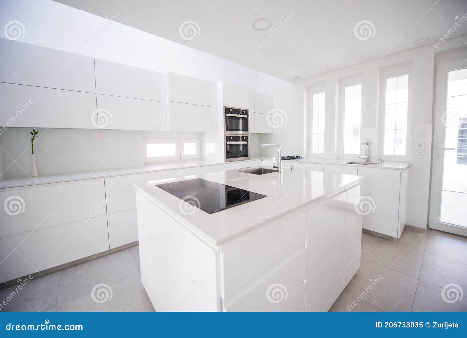 Modern White Kitchen ,Spacious Luxurious with Bar Design Stock Image ...