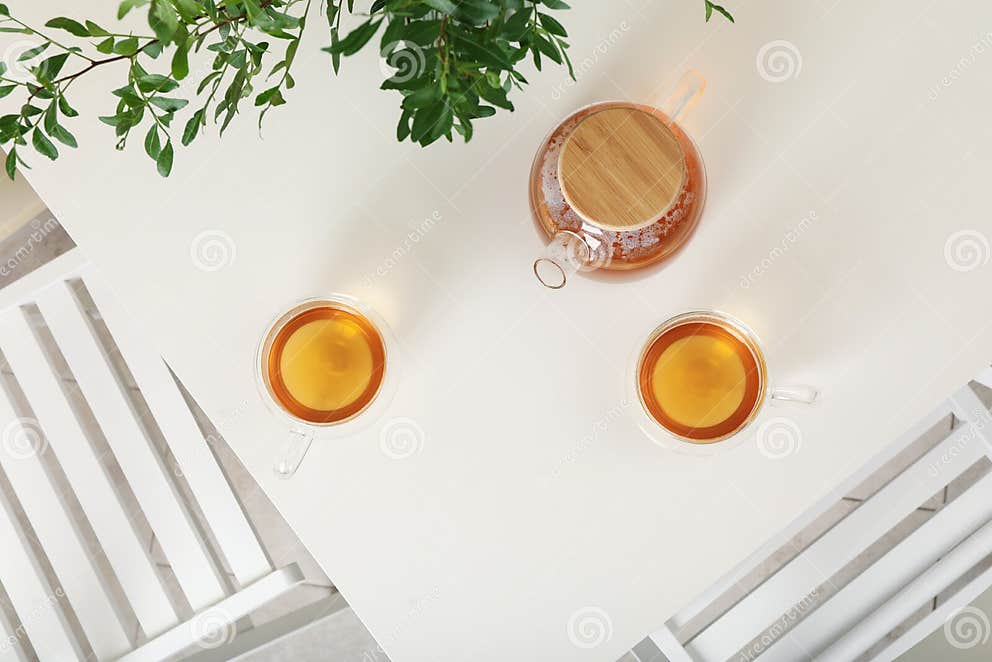 White Kitchen Table with Tea and Plant Stock Image - Image of herbal ...
