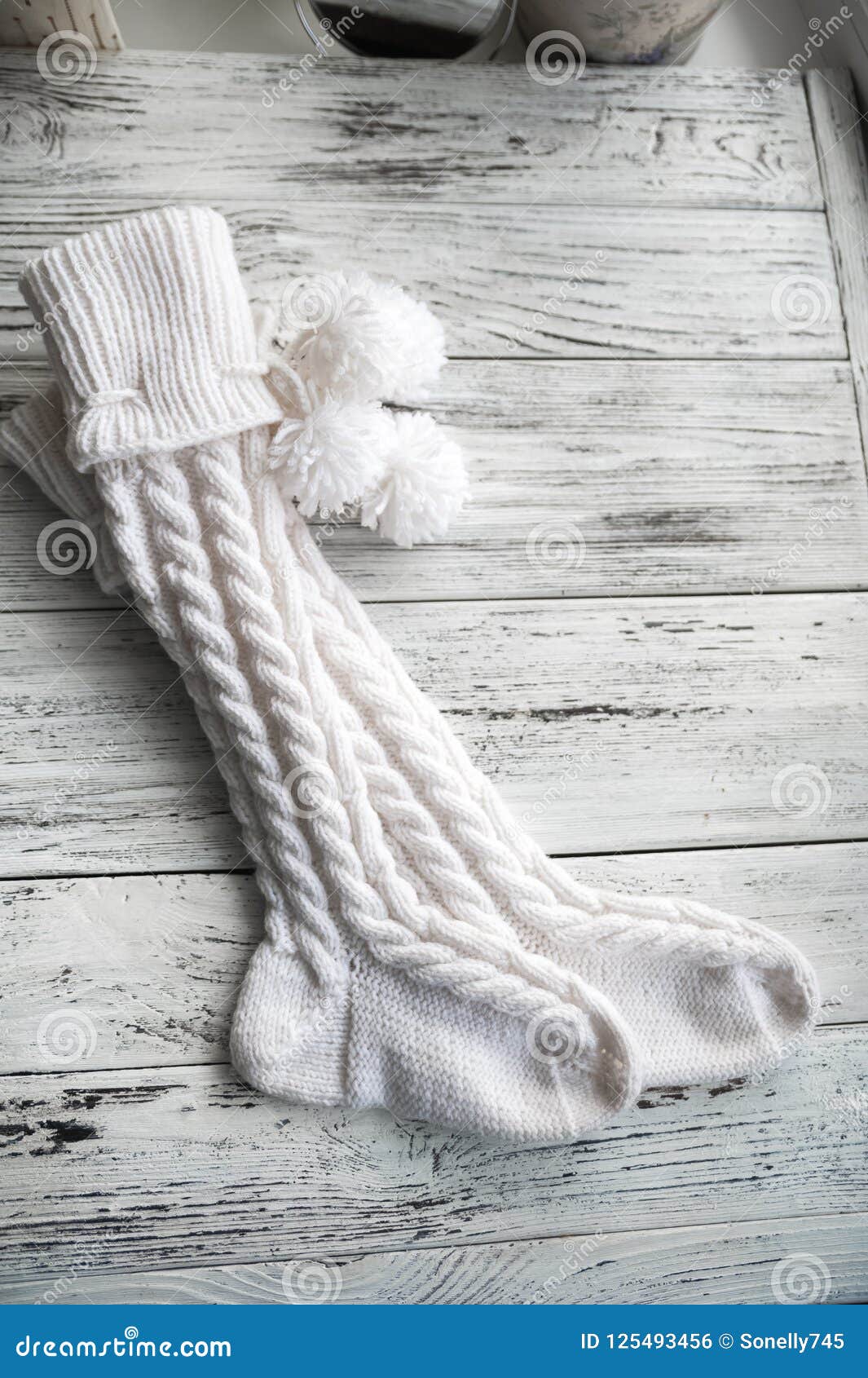White Knitted Socks, Handmade Socks on White Background. Texture of ...