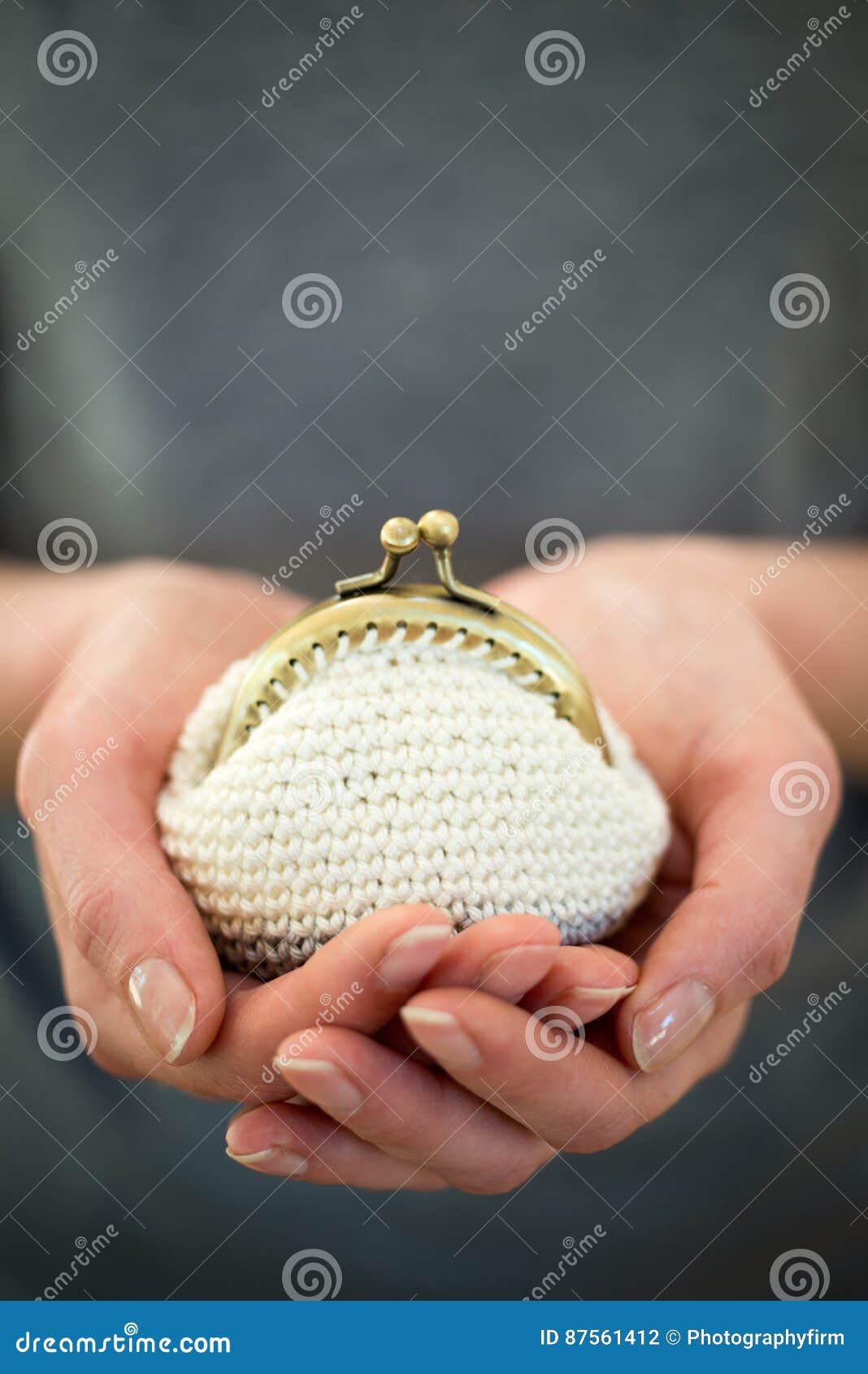 White Knitted Woolen Coin Purse in Hands Stock Photo - Image of hand ...