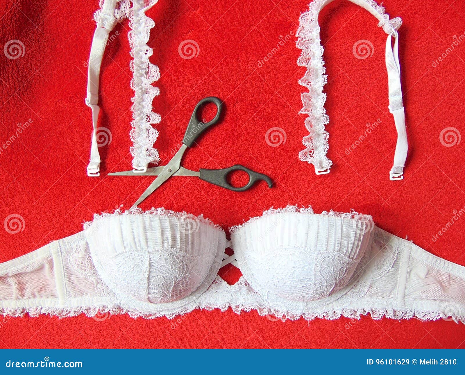White Lace Strapless Bra with Scissors Cutting the Straps Stock Image ...