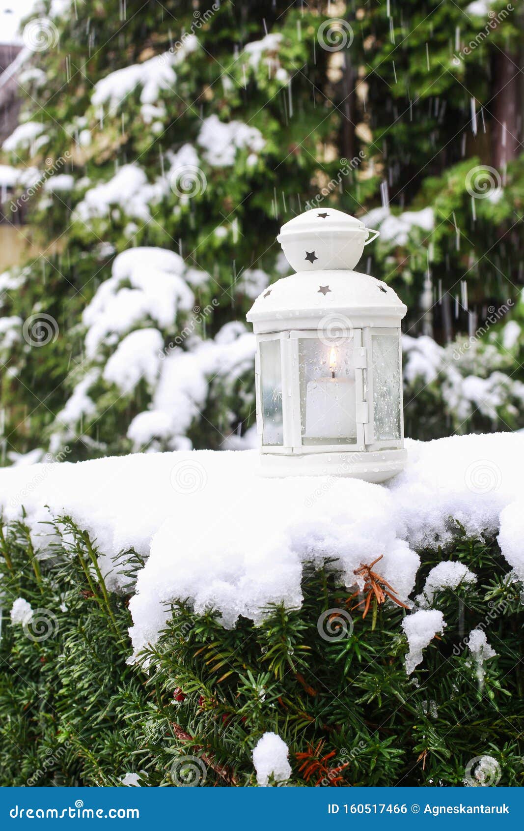 White lantern on snow stock photo. Image of glow, fairy - 160517466