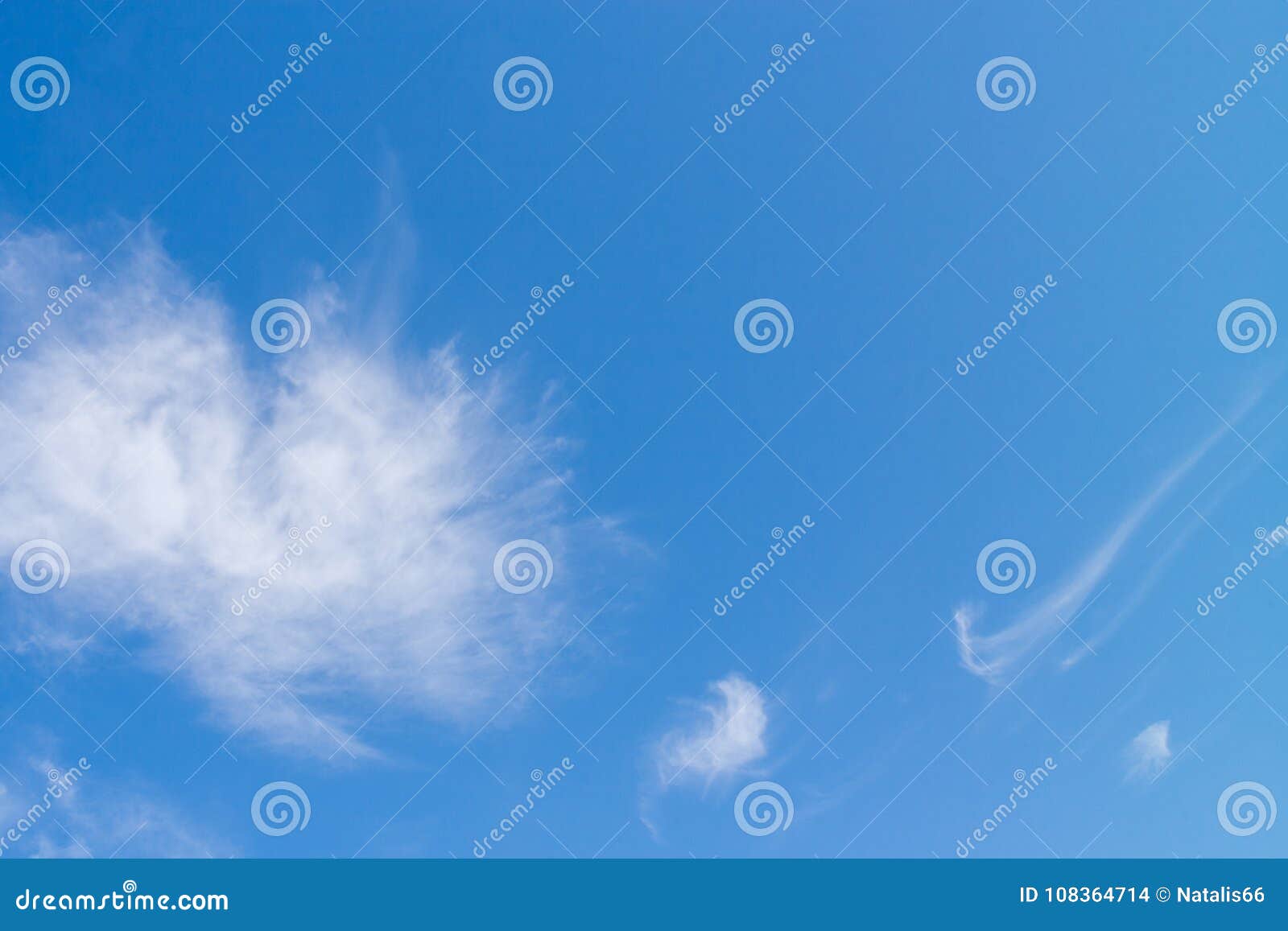 White Large Fluffy Rounded Cloud on Bright Blue Sky. Stock Photo ...