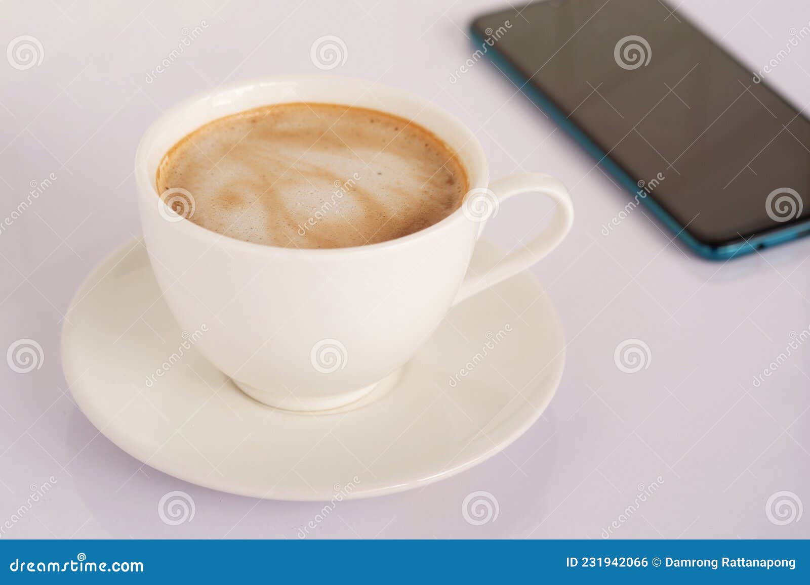White Latte Coffee Mug, Side View on White Desk and Mobile Phone Stock ...