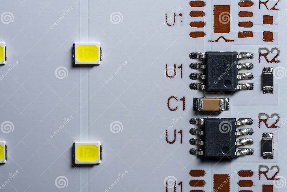 White LED Panel with Yellow Light and Microchip on Background, Top View ...