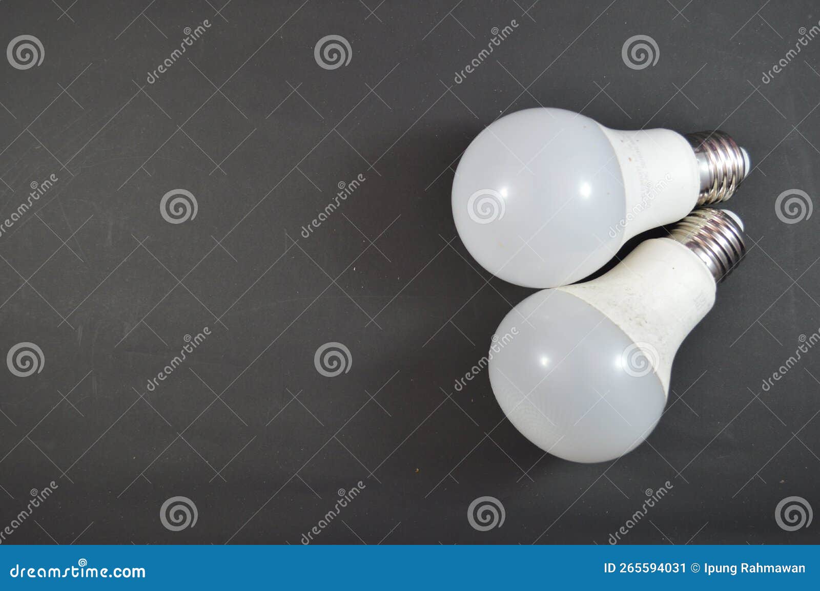 White Light Bulb on Black Background. Stock Image - Image of blue, hand ...
