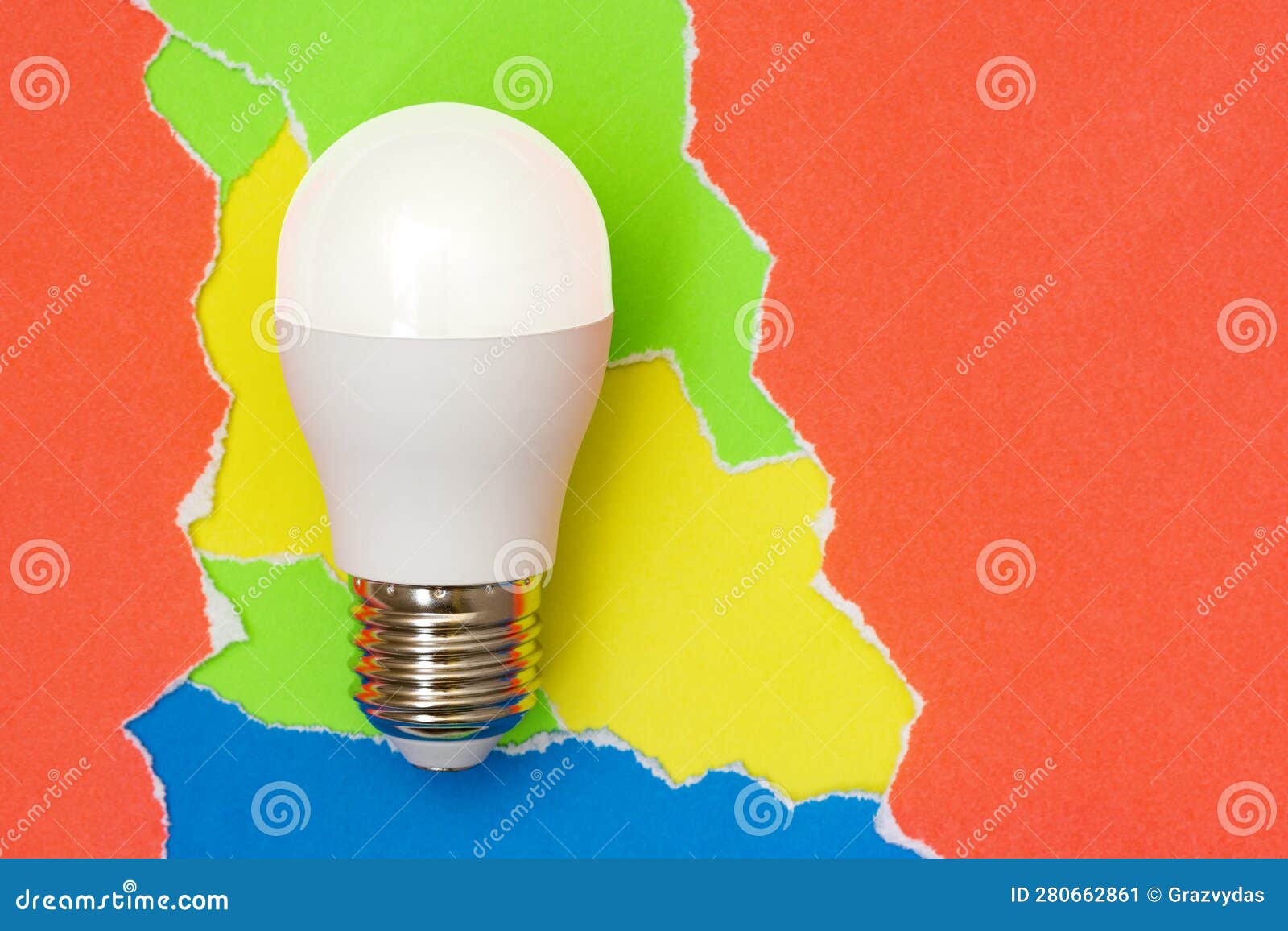 A White Light Bulb on Color Paper Background Stock Image - Image of ...