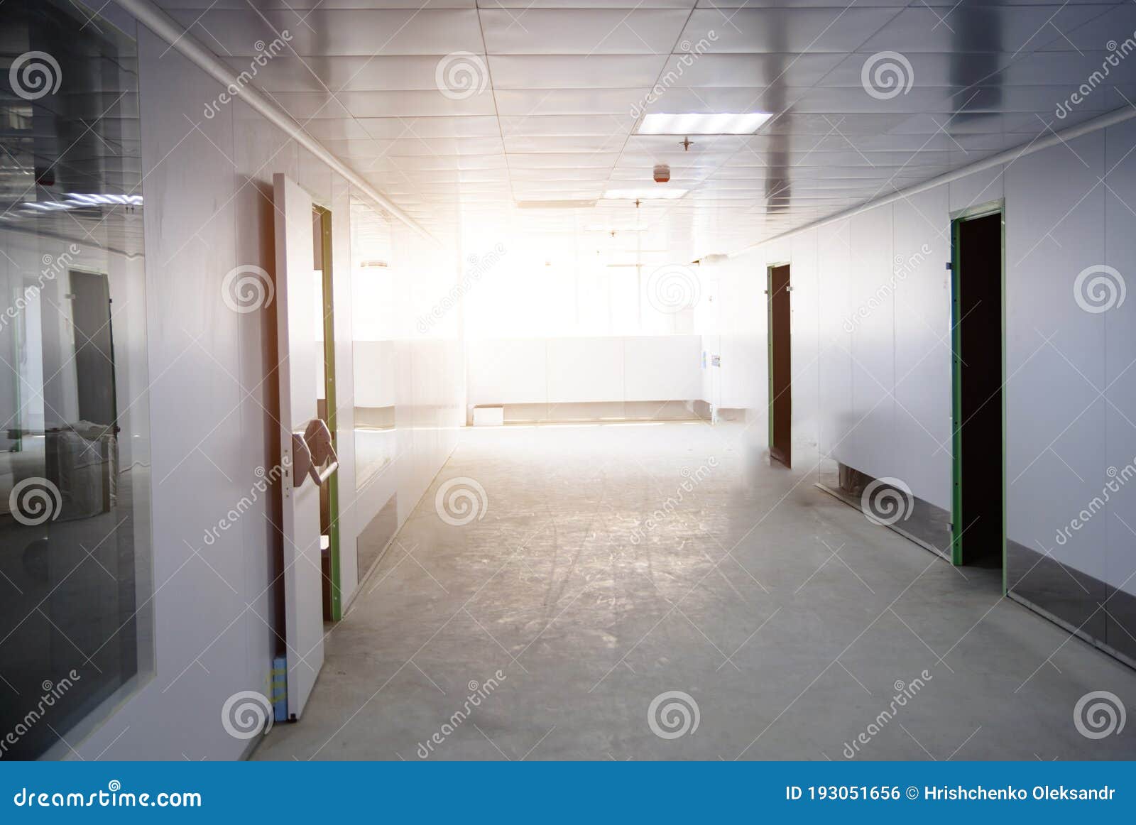 White Light Corridor with Boxes and Glass Windows Stock Photo - Image ...