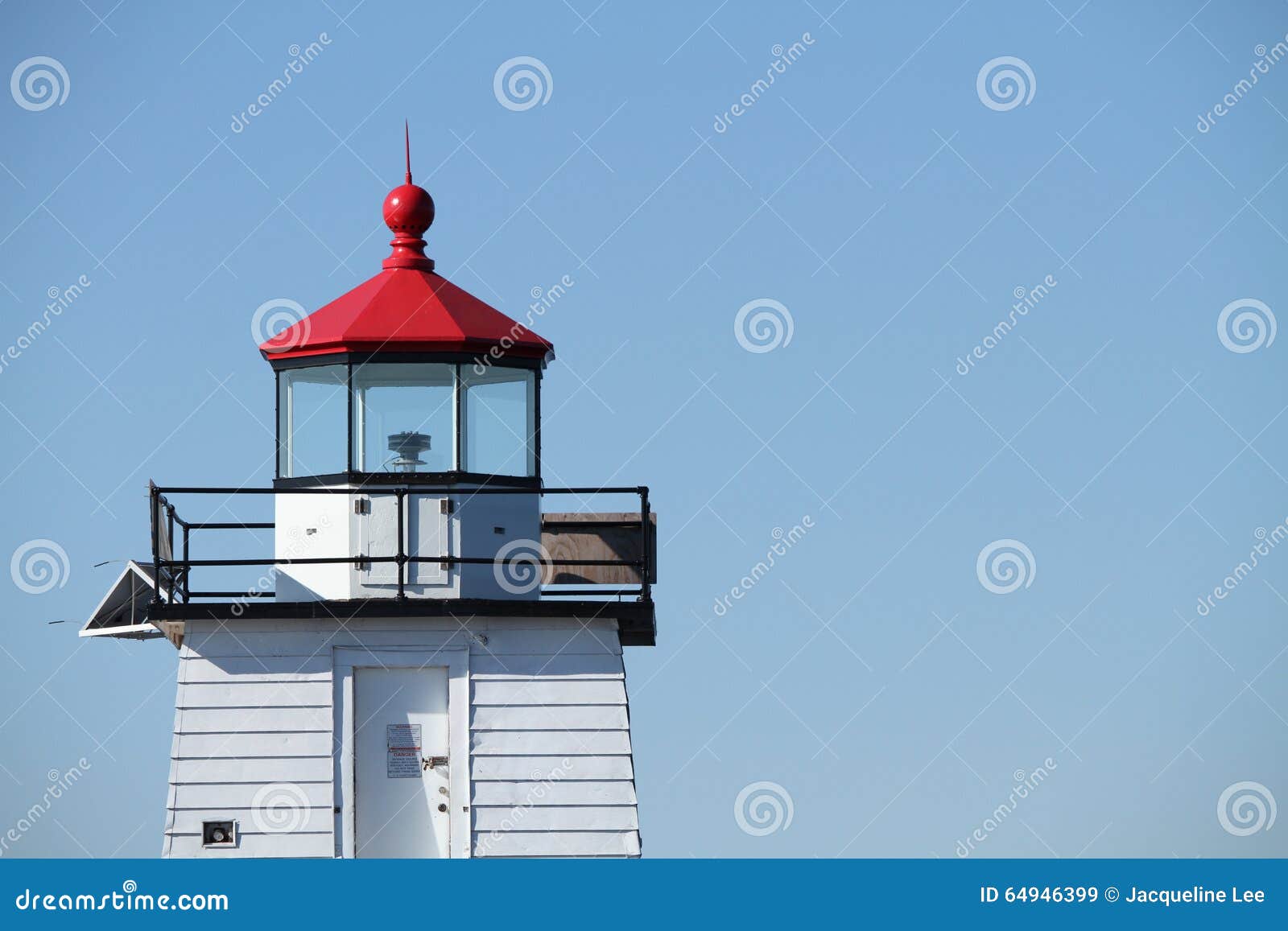 White Light House with a Red Top Stock Image - Image of lake, bright ...