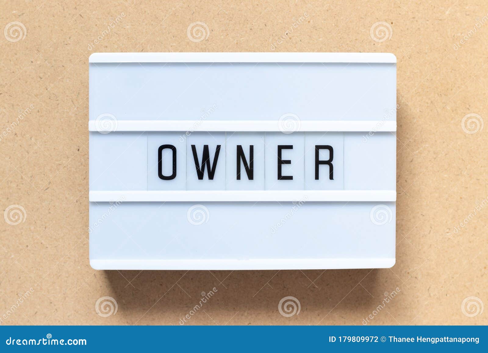 White Light Box with Word Owner on Wood Background Stock Photo - Image ...