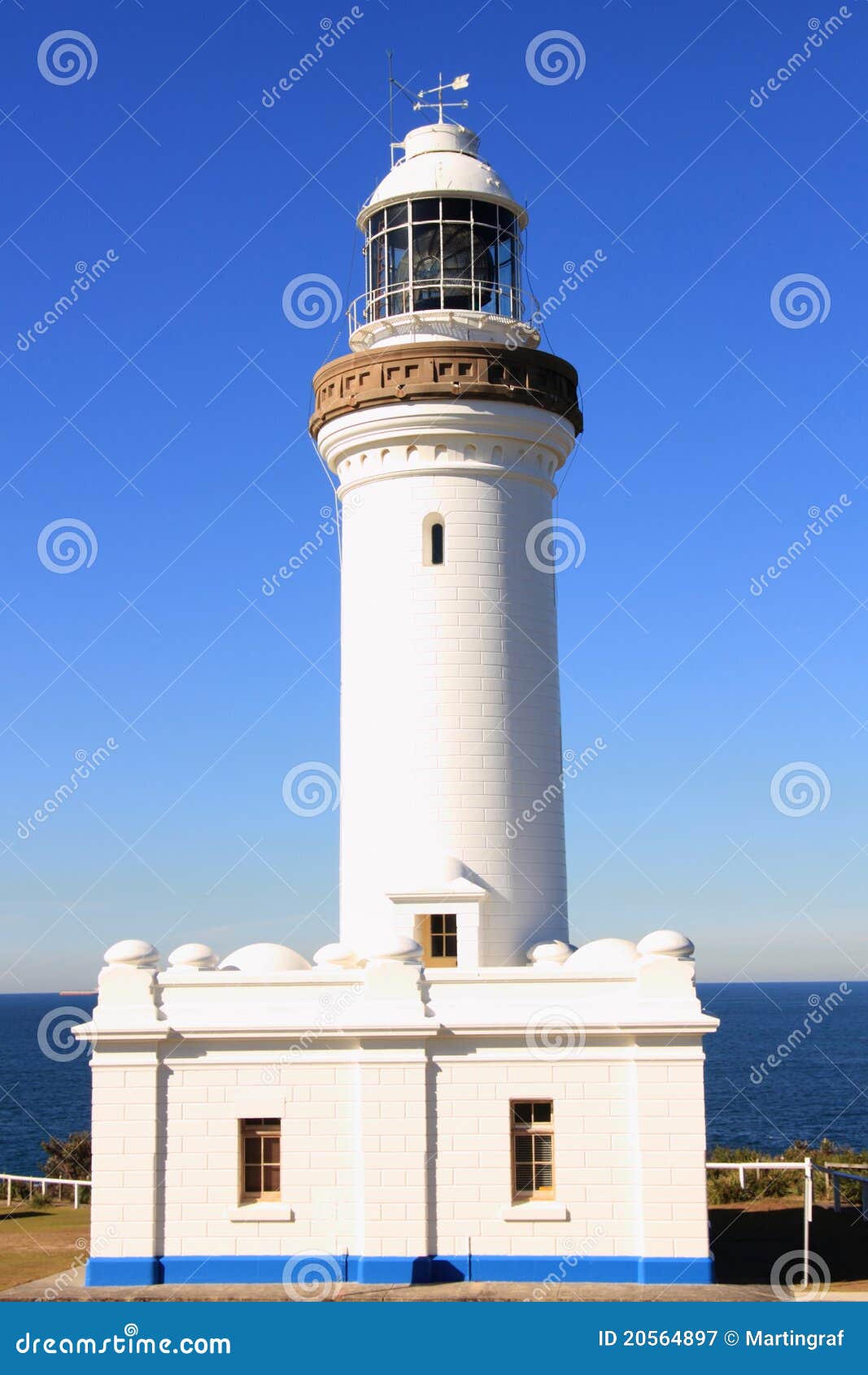 White Lighthouse by Blue Sky and Sea Stock Image - Image of majestic ...