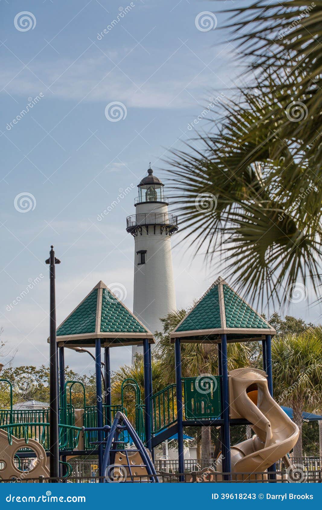 White Lighthouse Beyond Playground Stock Image - Image of lighthouse ...