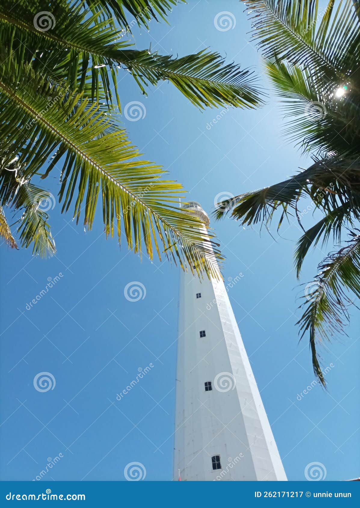 White lighthouse at resort stock image. Image of jungle - 262171217