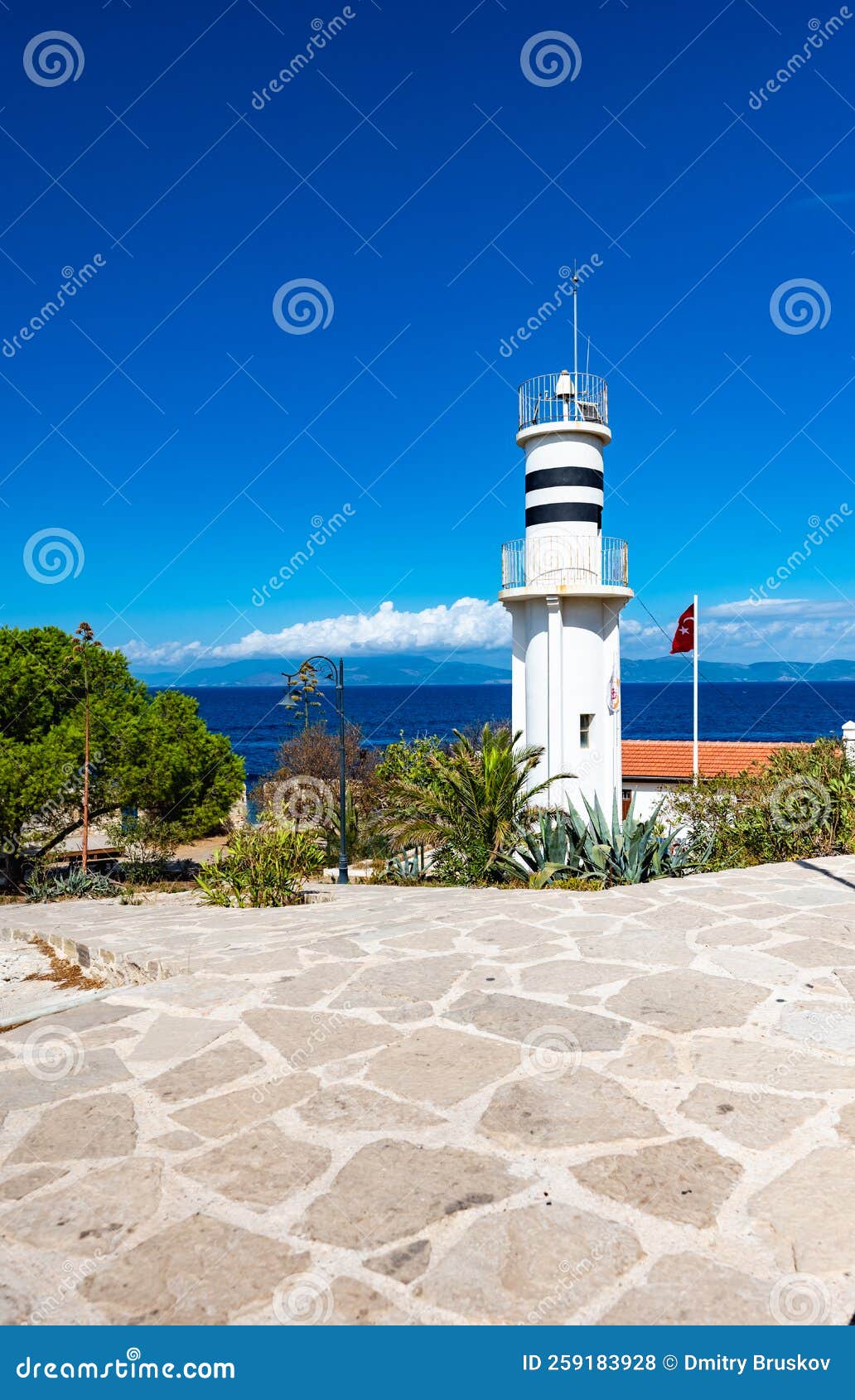 White Lighthouse on the Shore Stock Photo - Image of sailing, nature ...