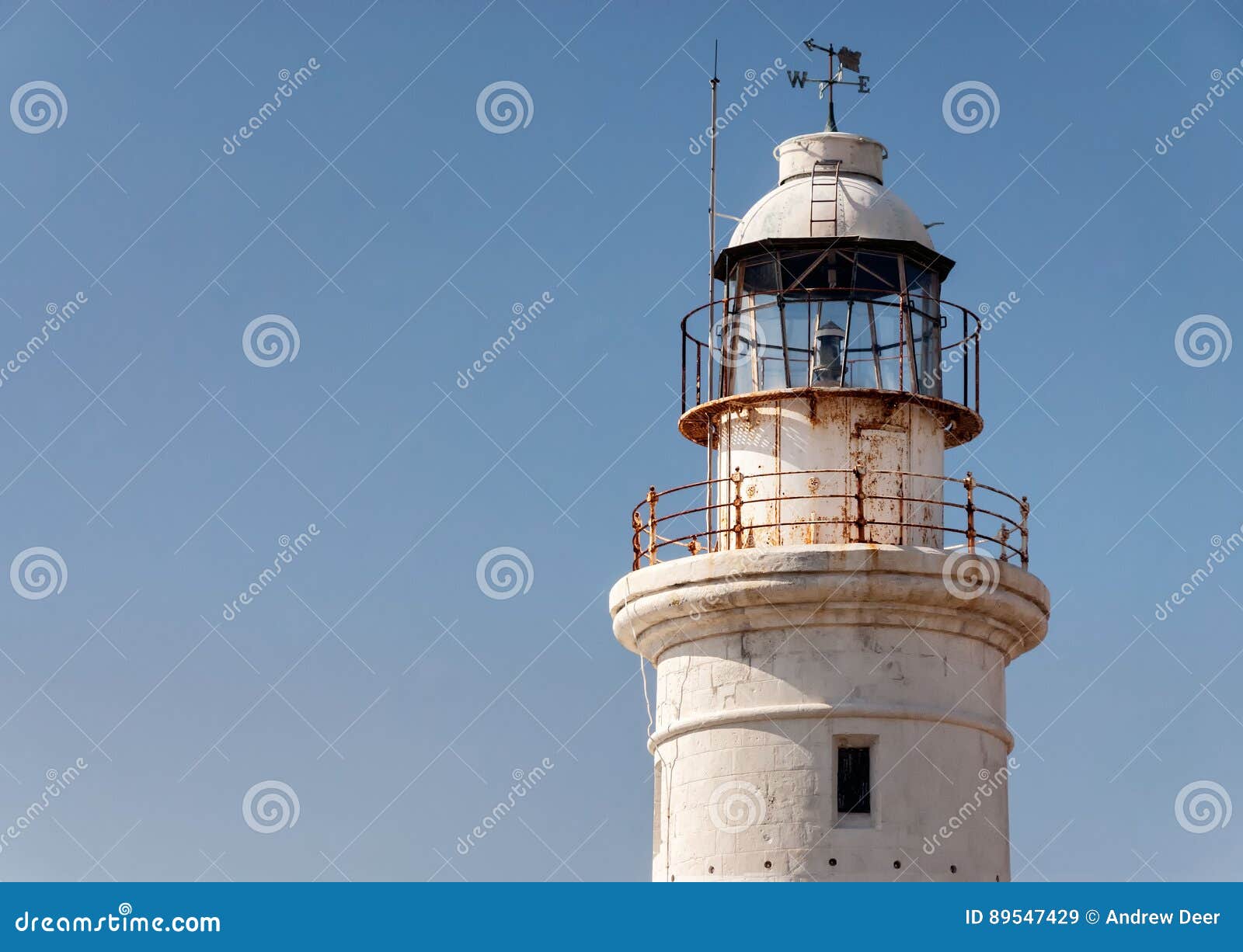 White Lighthouse with Weathervane Stock Image - Image of daytime, rusty ...