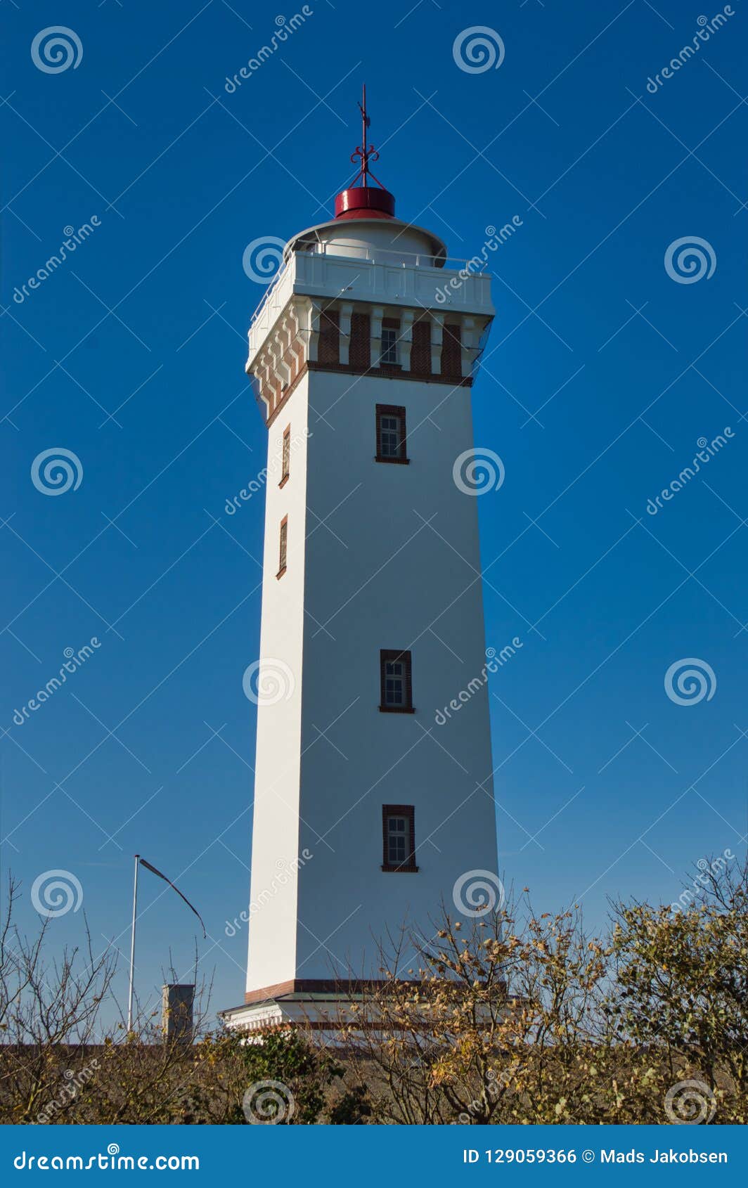 White Lighthouse stock photo. Image of lighthouse, dark - 129059366