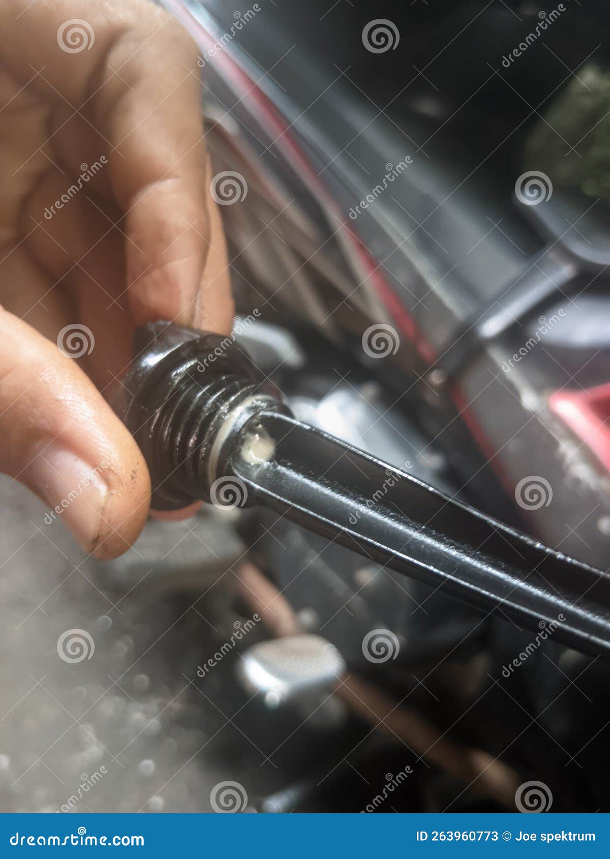 White Liquid Sticks To the Engine Cover of the Engine, Indicating There ...