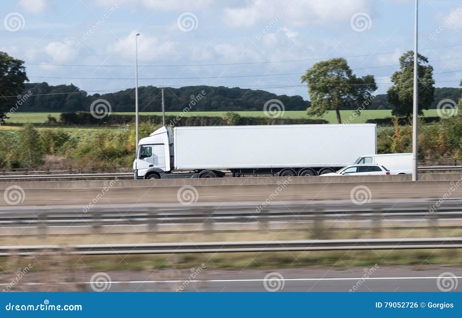 White lorry on the road stock photo. Image of landscape - 79052726