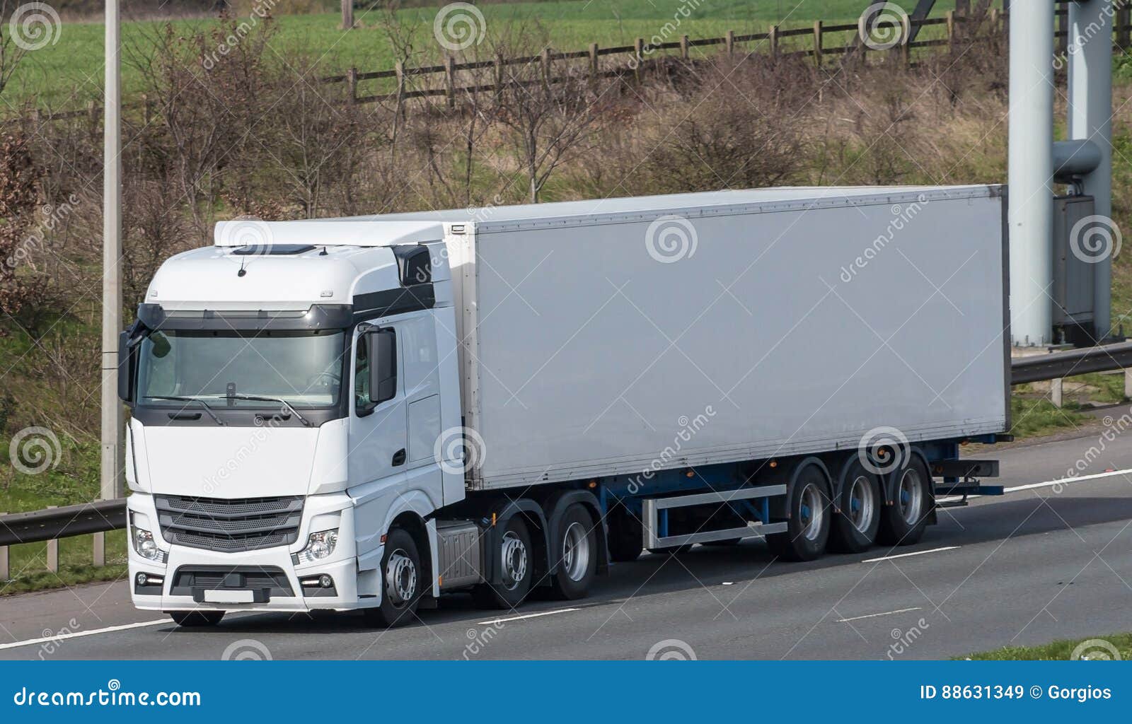 White lorry on the road stock image. Image of haulage - 88631349