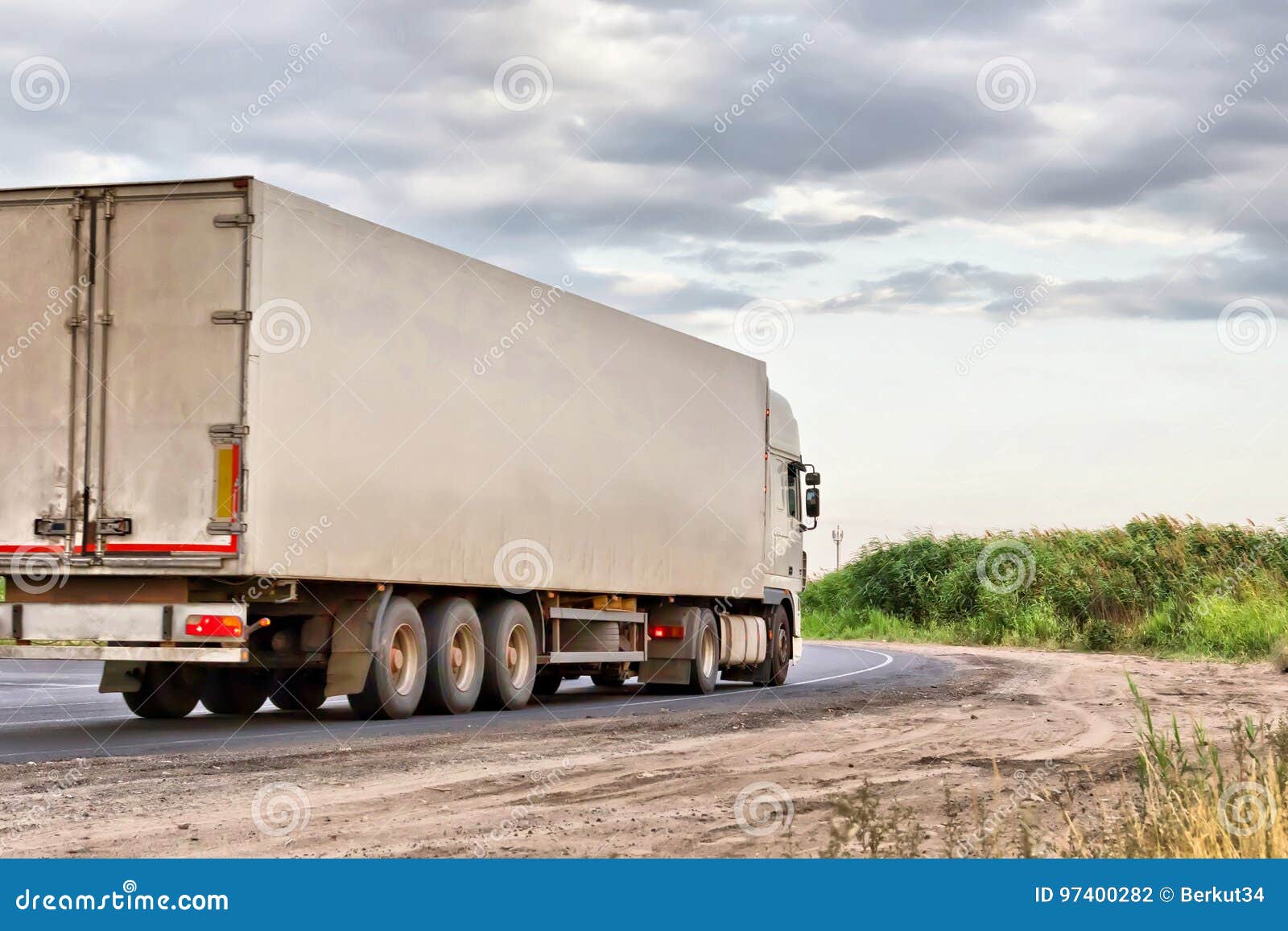 White Lorry with White Trailer Over Blue Sky on the Road Stock Photo ...