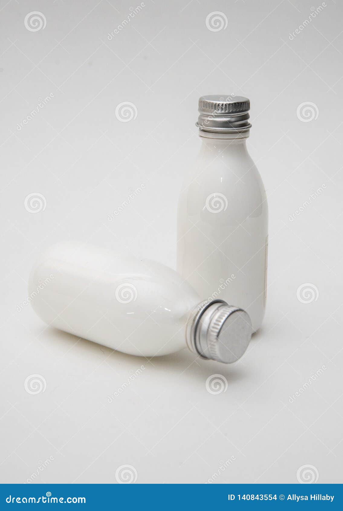 White lotion bottles stock photo. Image of beach, modern - 140843554