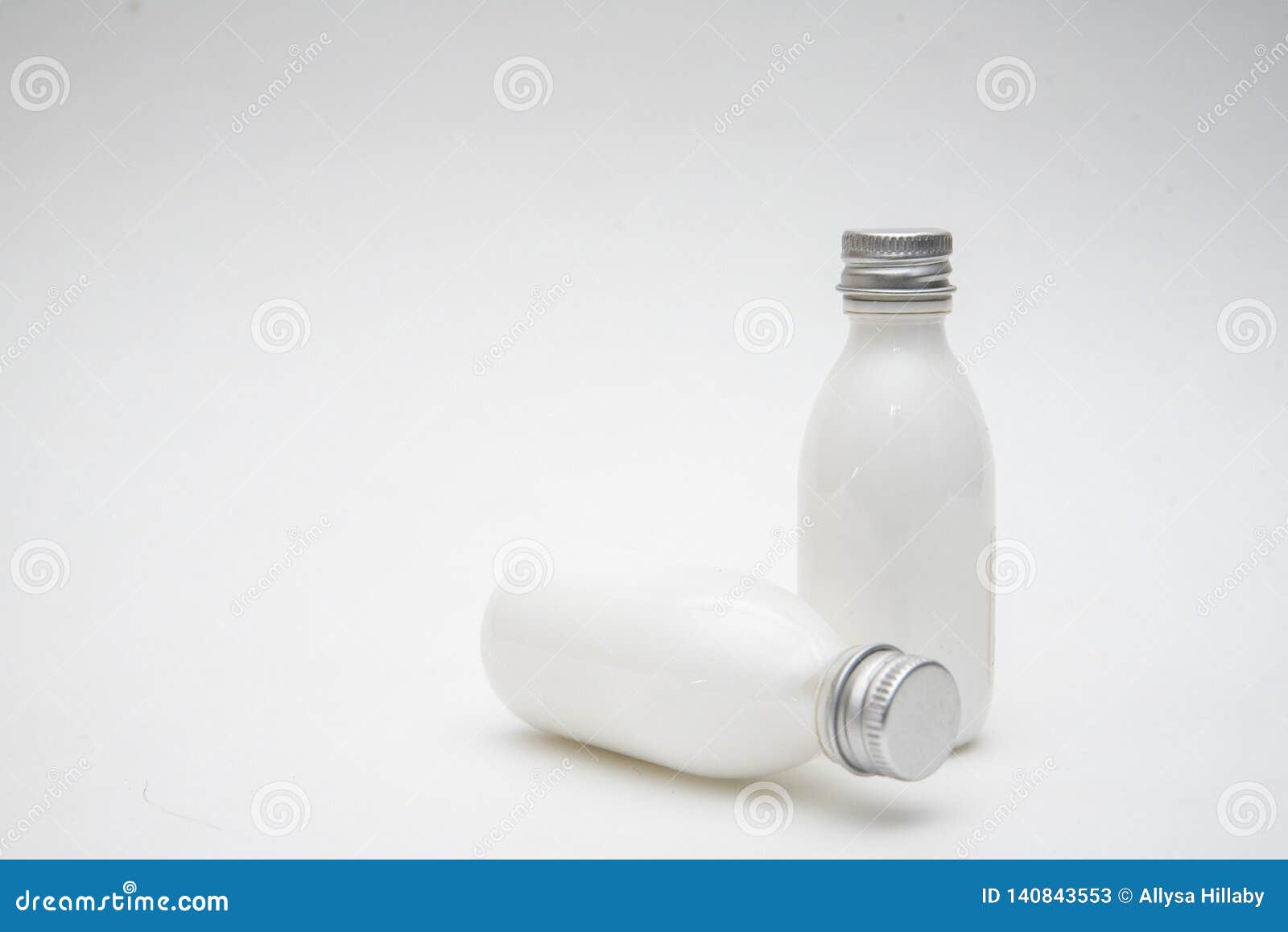 White lotion bottles stock image. Image of bottles, nature - 140843553
